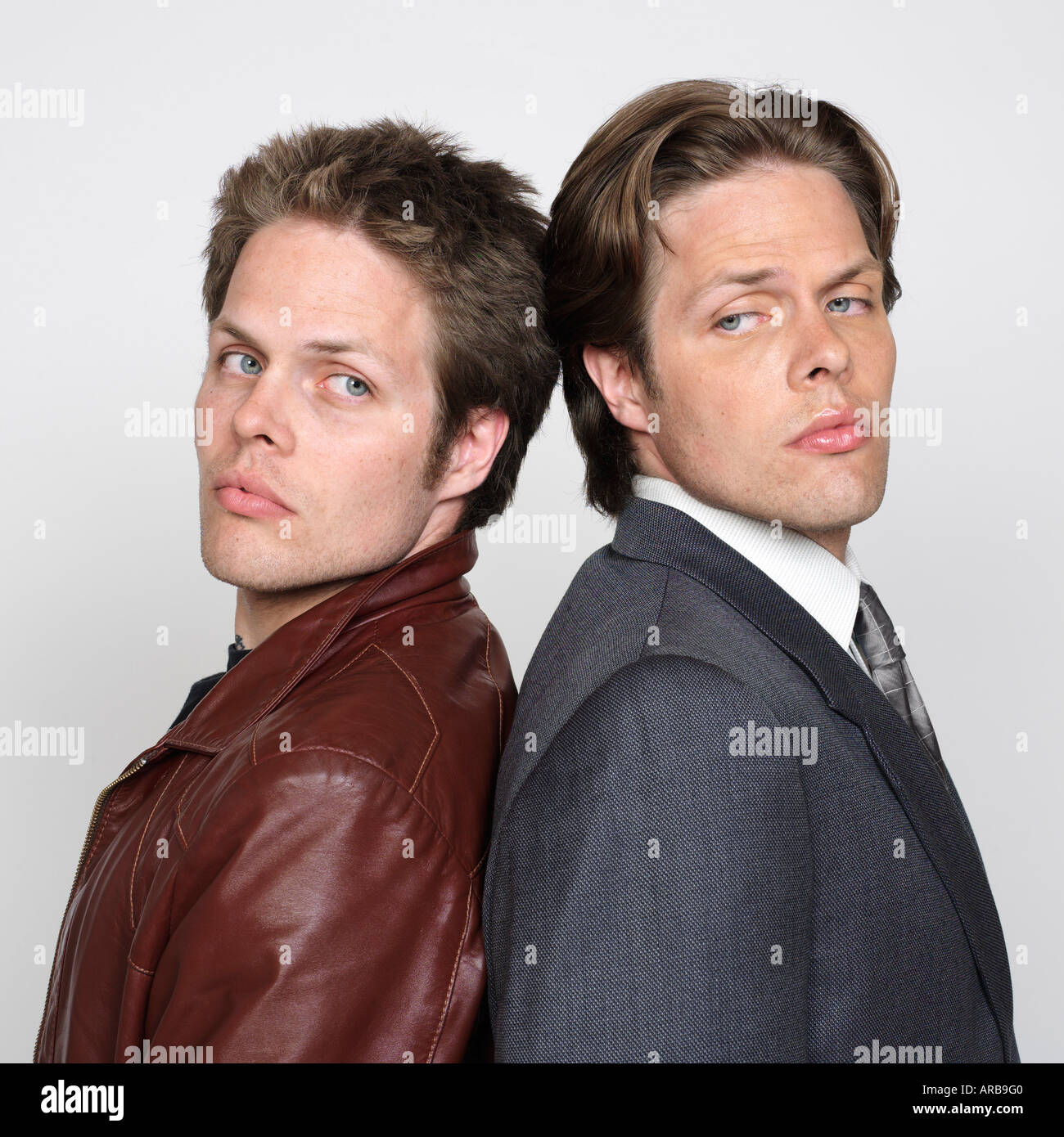 Portrait identical adult male twins hi-res stock photography and images ...