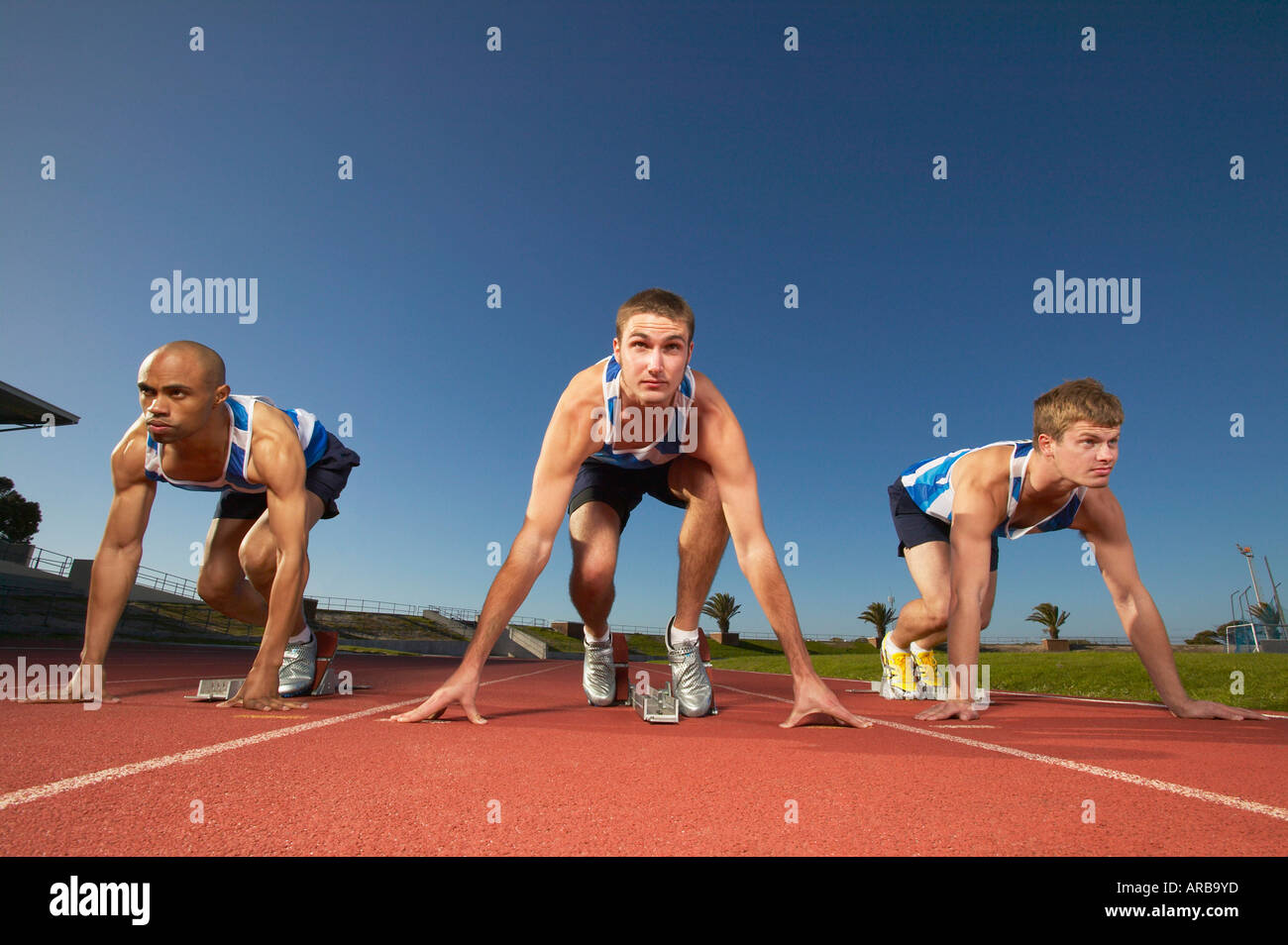 Three sprinters racing hi-res stock photography and images - Alamy