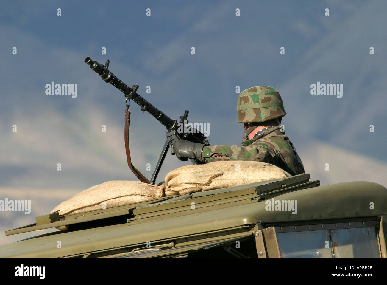 Uniform helmets machine gun rifles hi-res stock photography and images ...