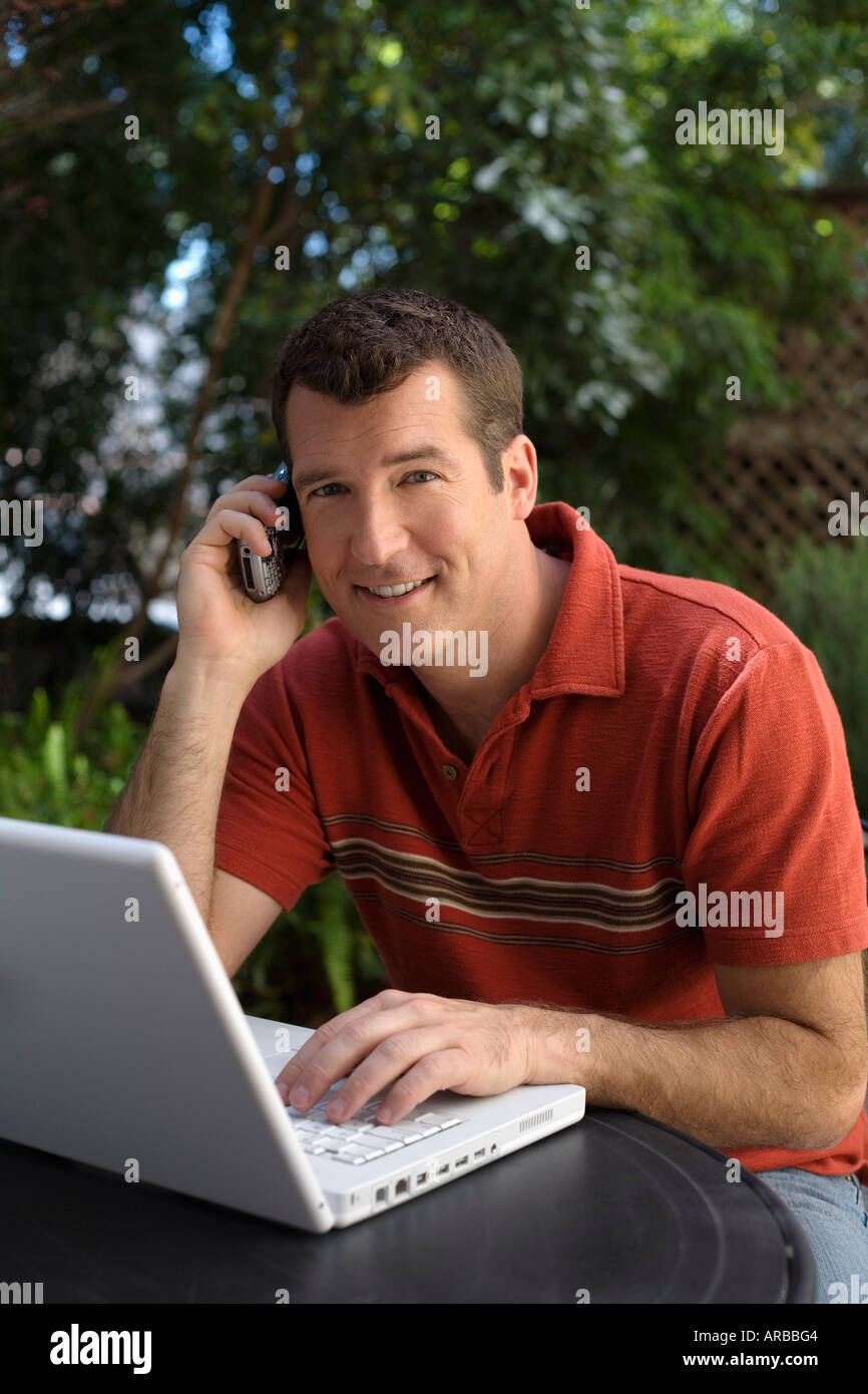 Man work computer lap top laptop outside hi-res stock photography and ...