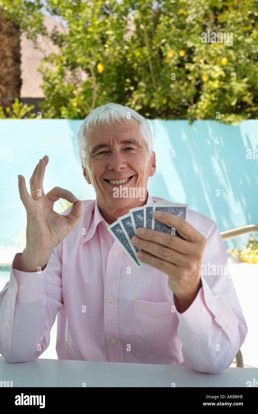 Hand poker player holding one hi-res stock photography and images - Alamy