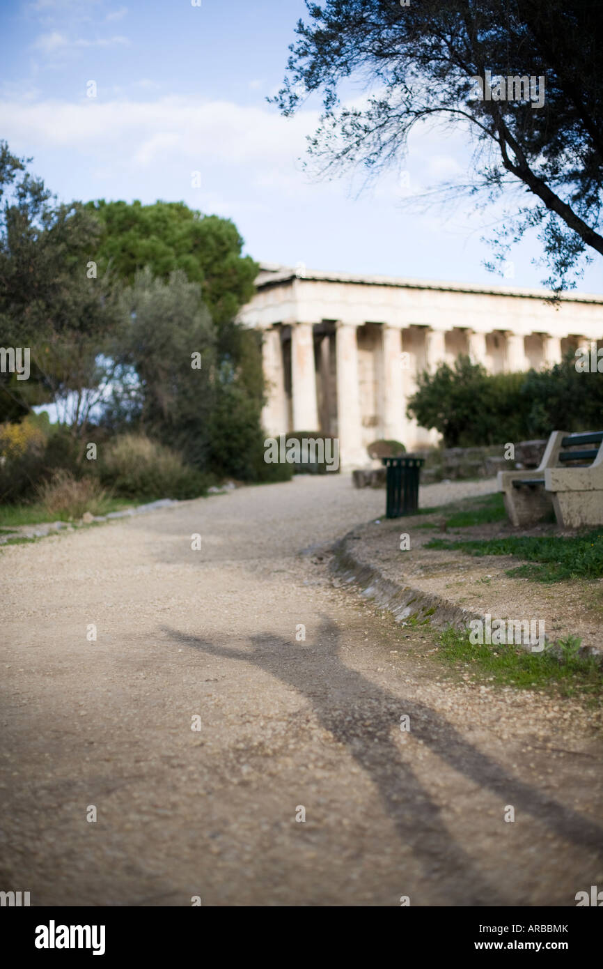 human shadow on the ground with arms raised Stock Photo - Alamy