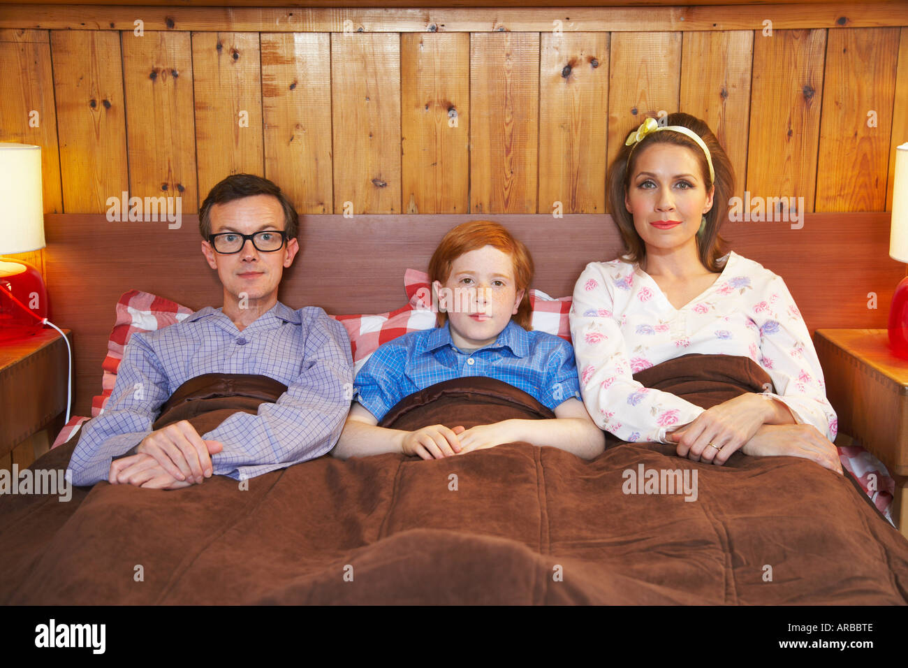 Man woman bed under covers hi-res stock photography and images - Alamy