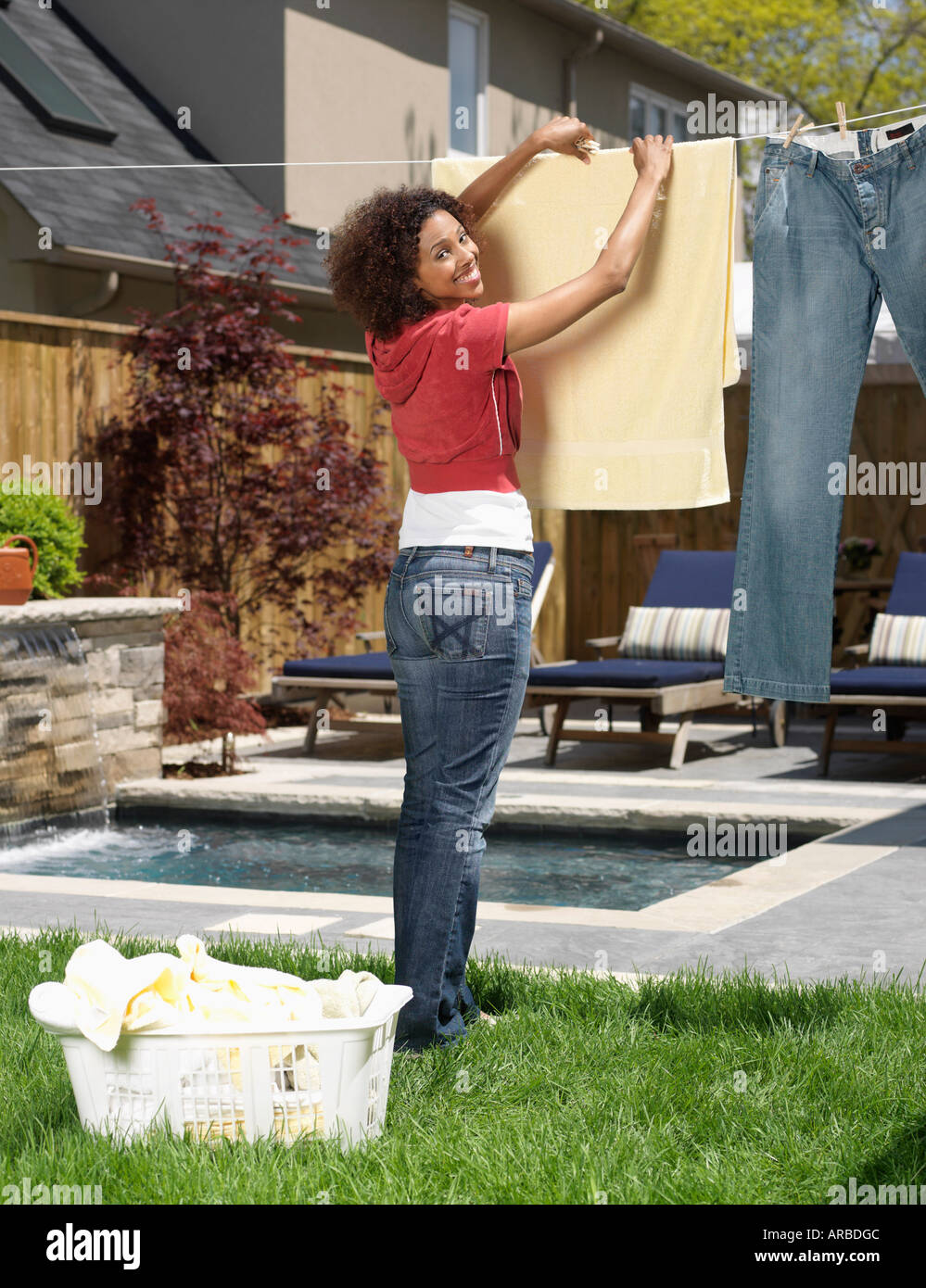 Old lady hang out washing hi-res stock photography and images - Alamy