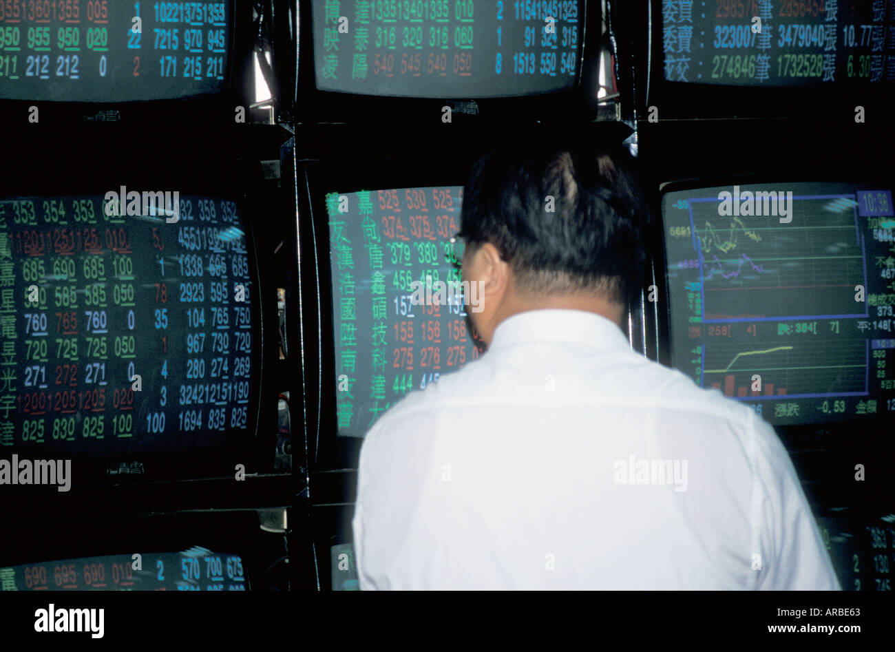 Man studying stock report hi-res stock photography and images - Alamy