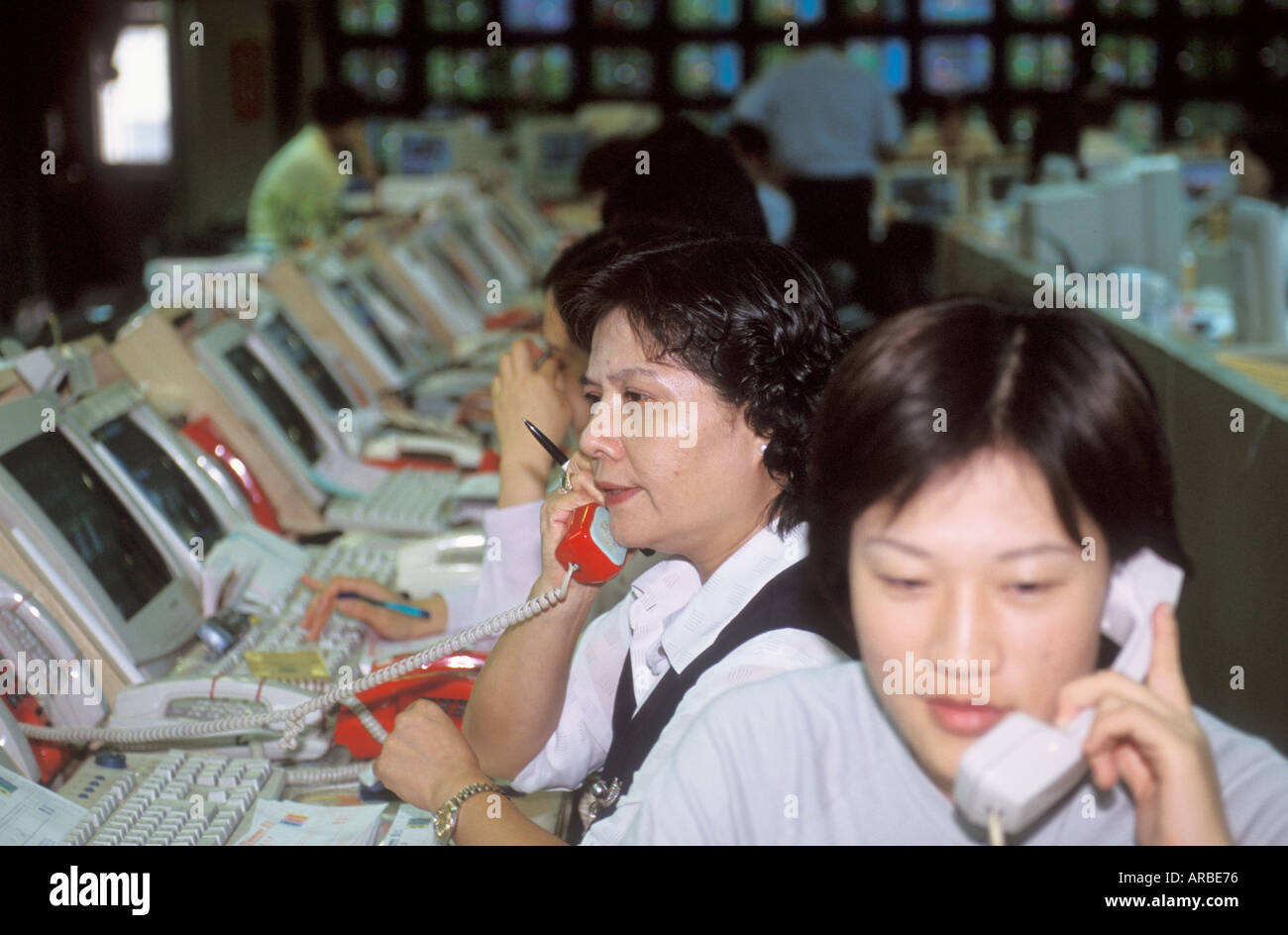 Woman working stock trading hi-res stock photography and images - Alamy