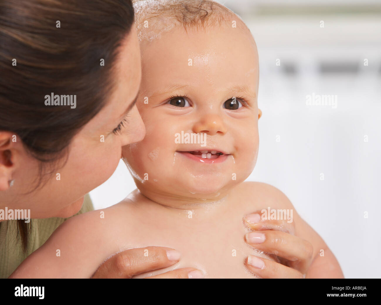 Loving Mother Taking Care Of Her Baby High Resolution Stock Photography ...