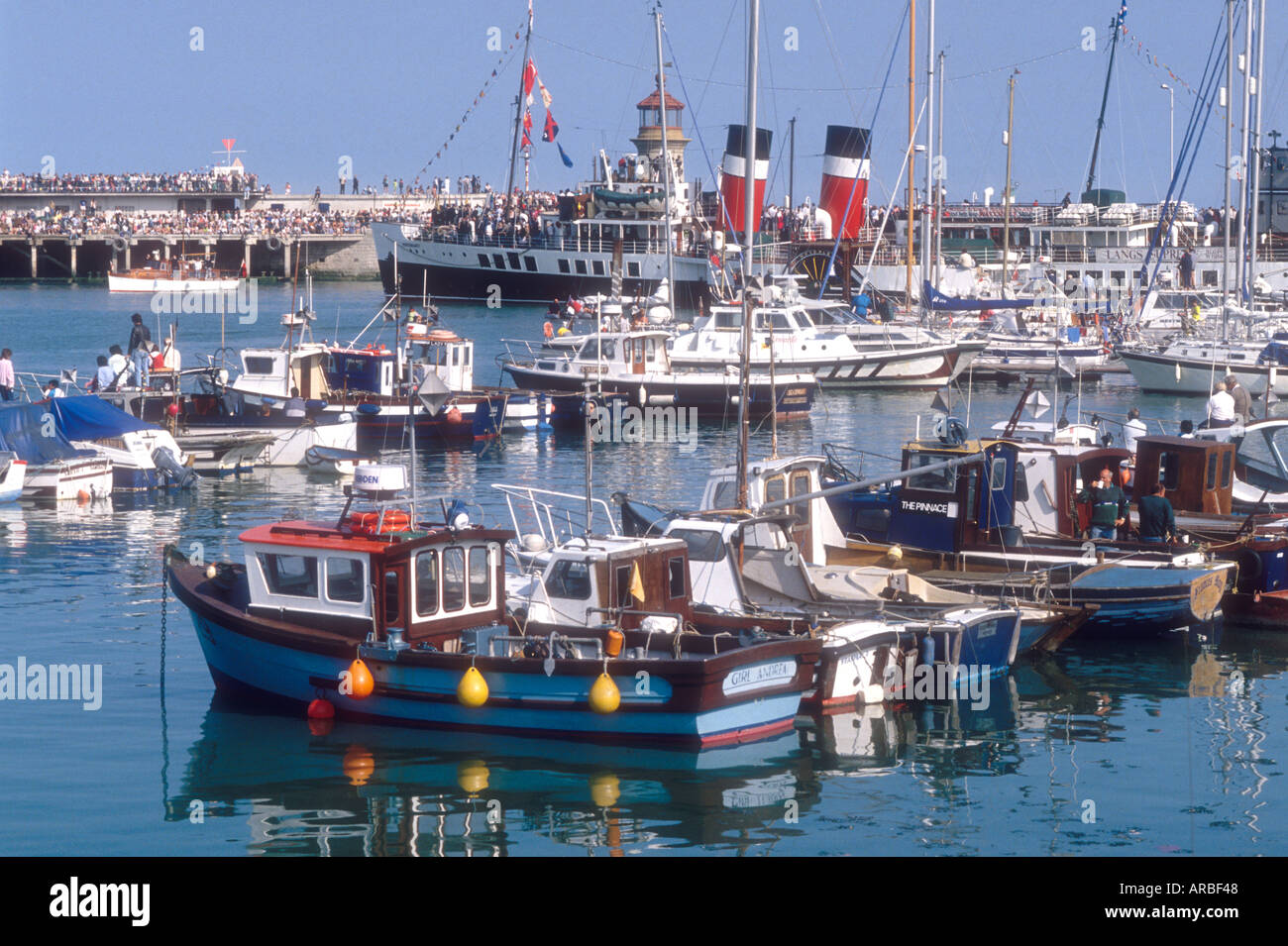 Various boats and the paddle steamer SS Waverley at Ramsgate Harbour in ...