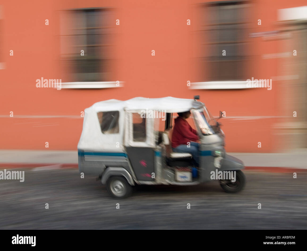 Three wheeled taxis made in India in use in tours Stock Photo - Alamy