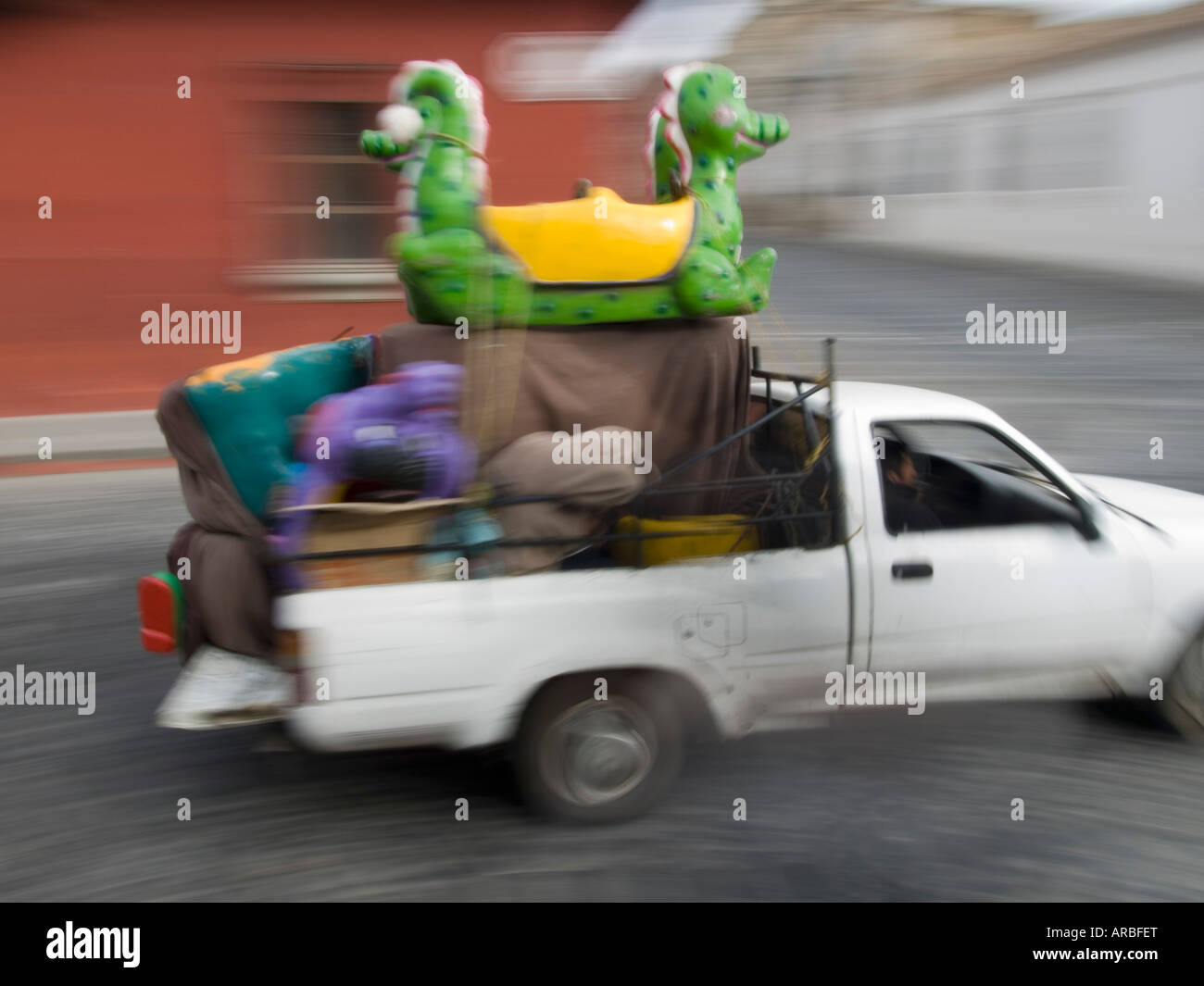 Vehicles passing by blurred by slow shutter speed Stock Photo - Alamy