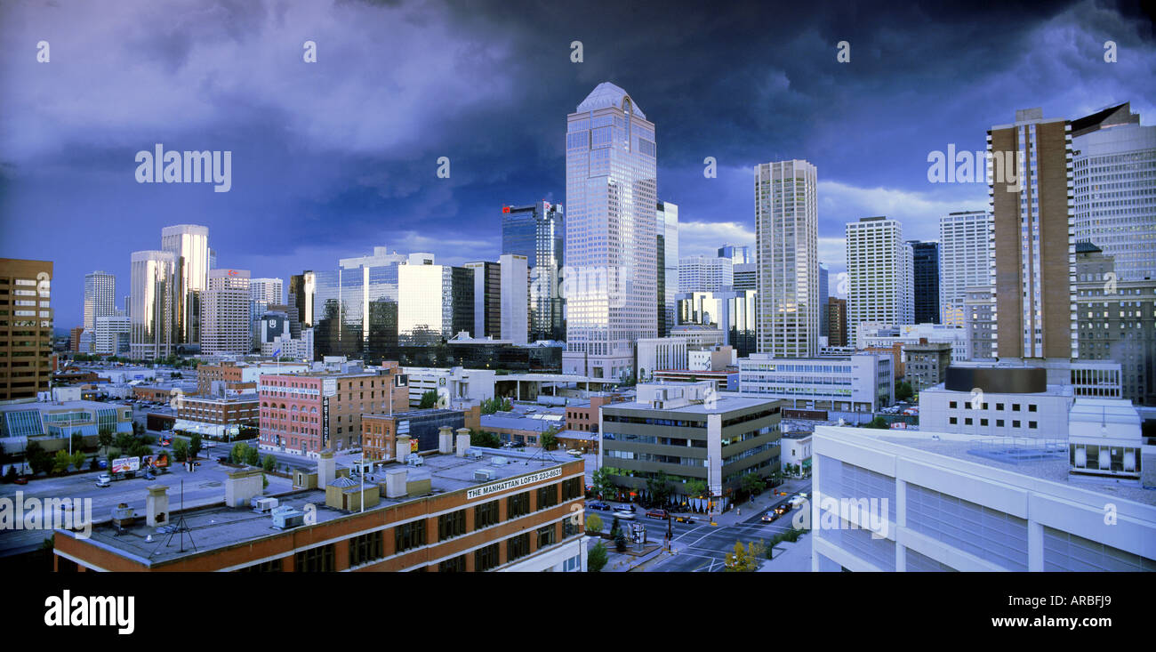 Calgary skyline highlighted under dark clouds in Alberta Canada Stock ...