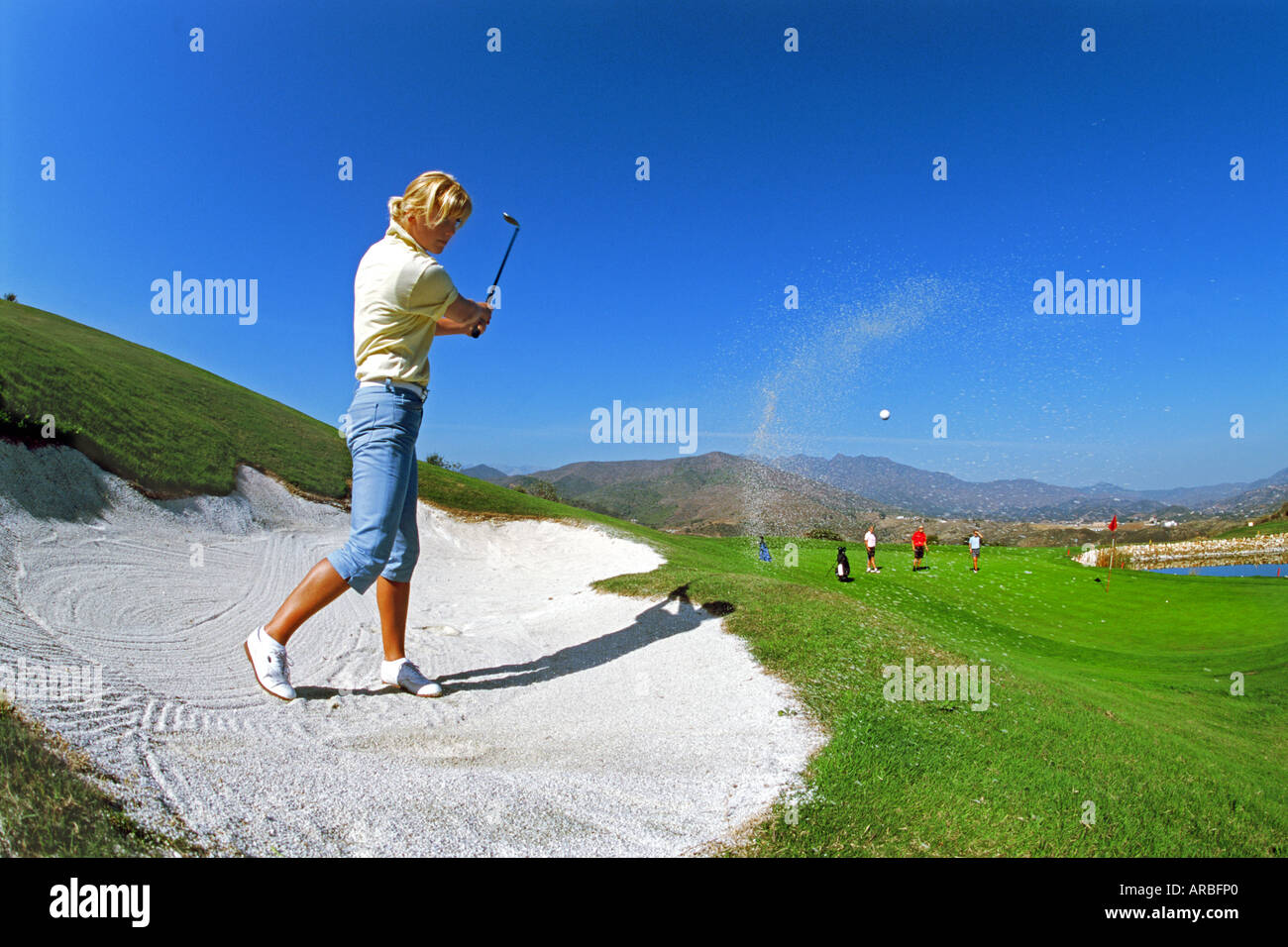 Golf course amid mountains, valleys and green fairways on north course ...