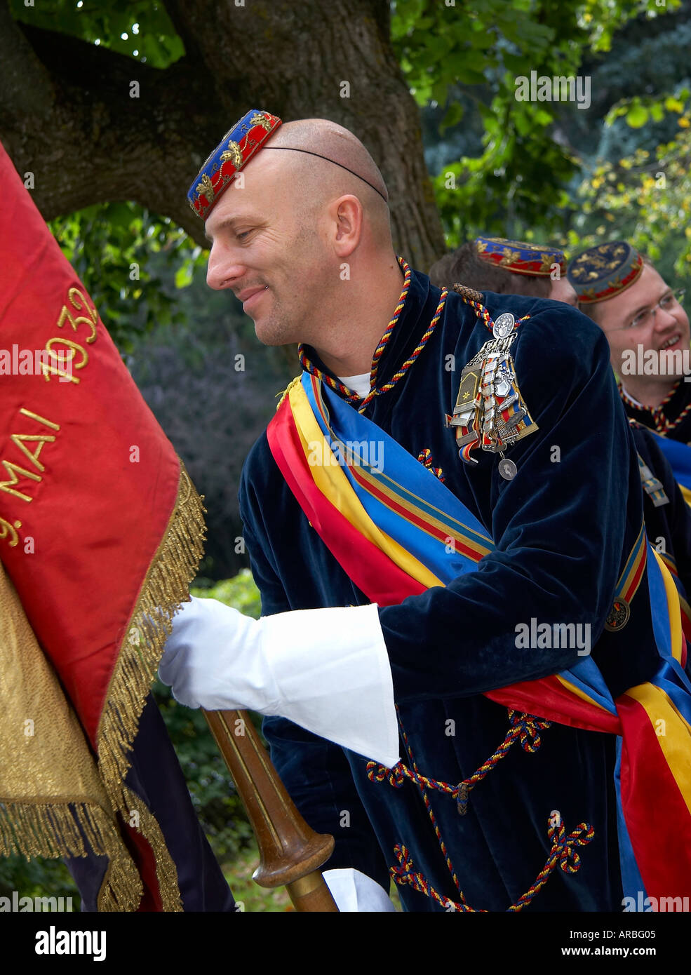 member of fraternity with flag Stock Photo - Alamy