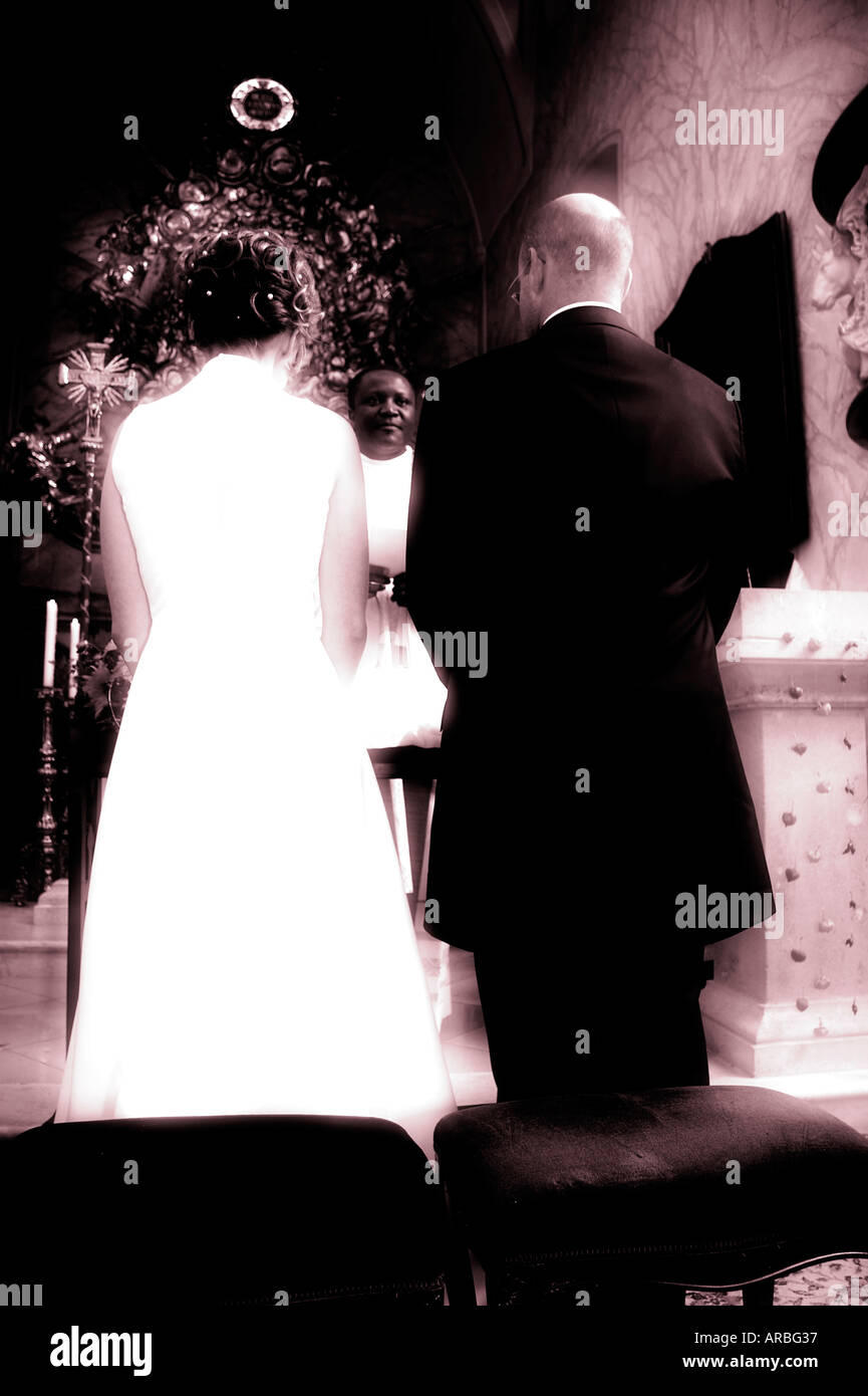 bridal couple at the altar Stock Photo - Alamy