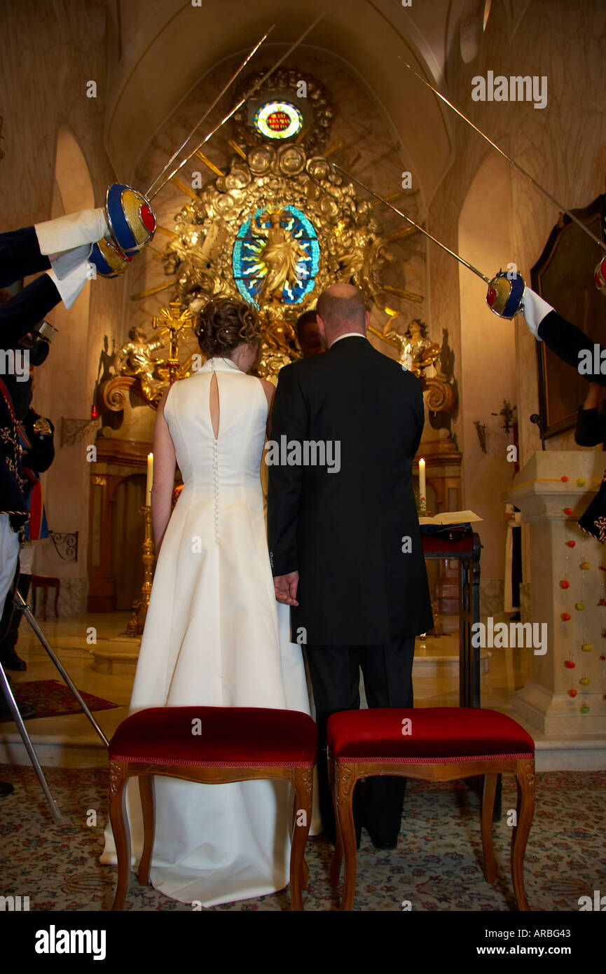 bridal couple at the altar Stock Photo - Alamy