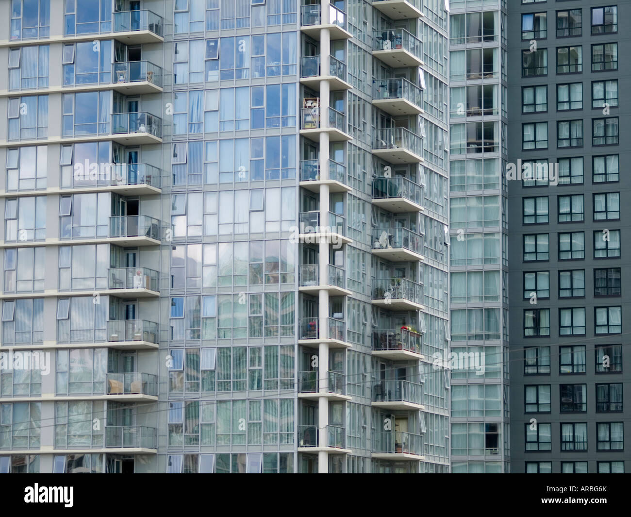 Glass encased new building facades Stock Photo - Alamy