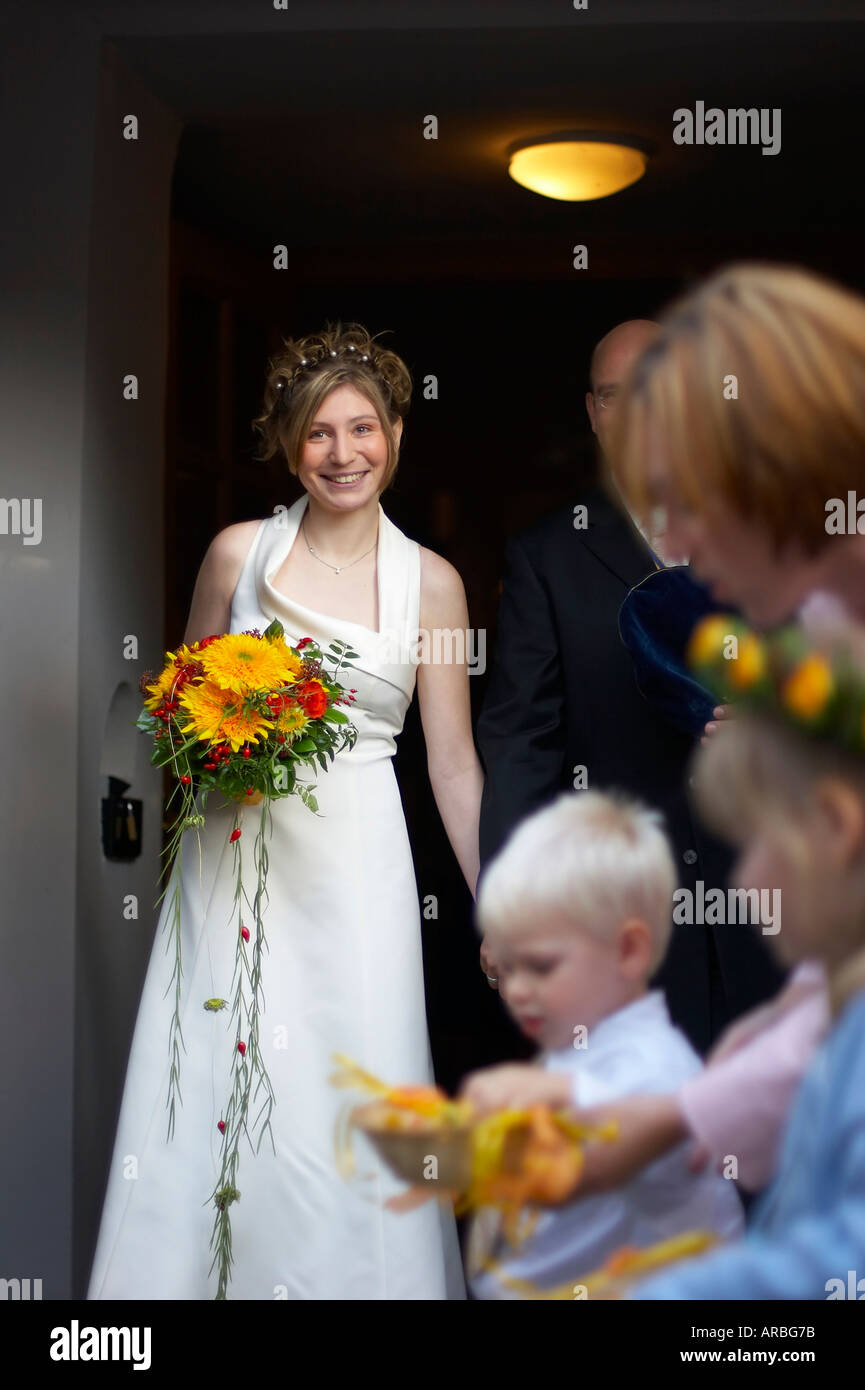 bridal couple leaving the church Stock Photo - Alamy