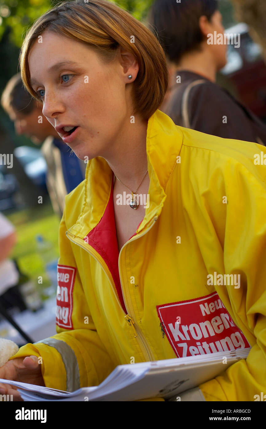 Girl selling newspapers hi-res stock photography and images - Alamy