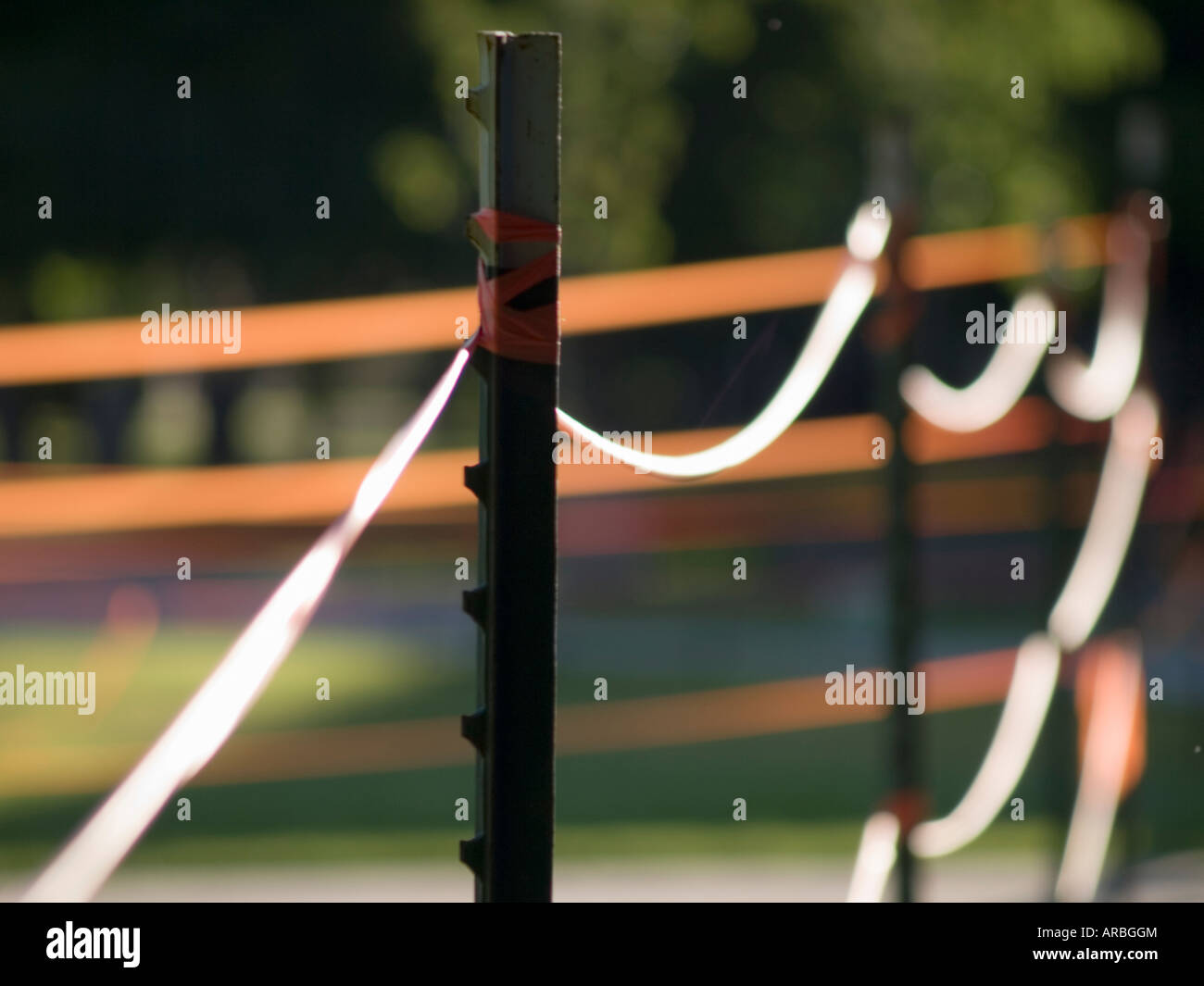 Tape indicating off limits lawn Stock Photo - Alamy