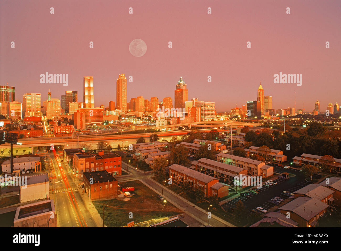 City skyline, apartment buildings and roads around Atlanta under full ...