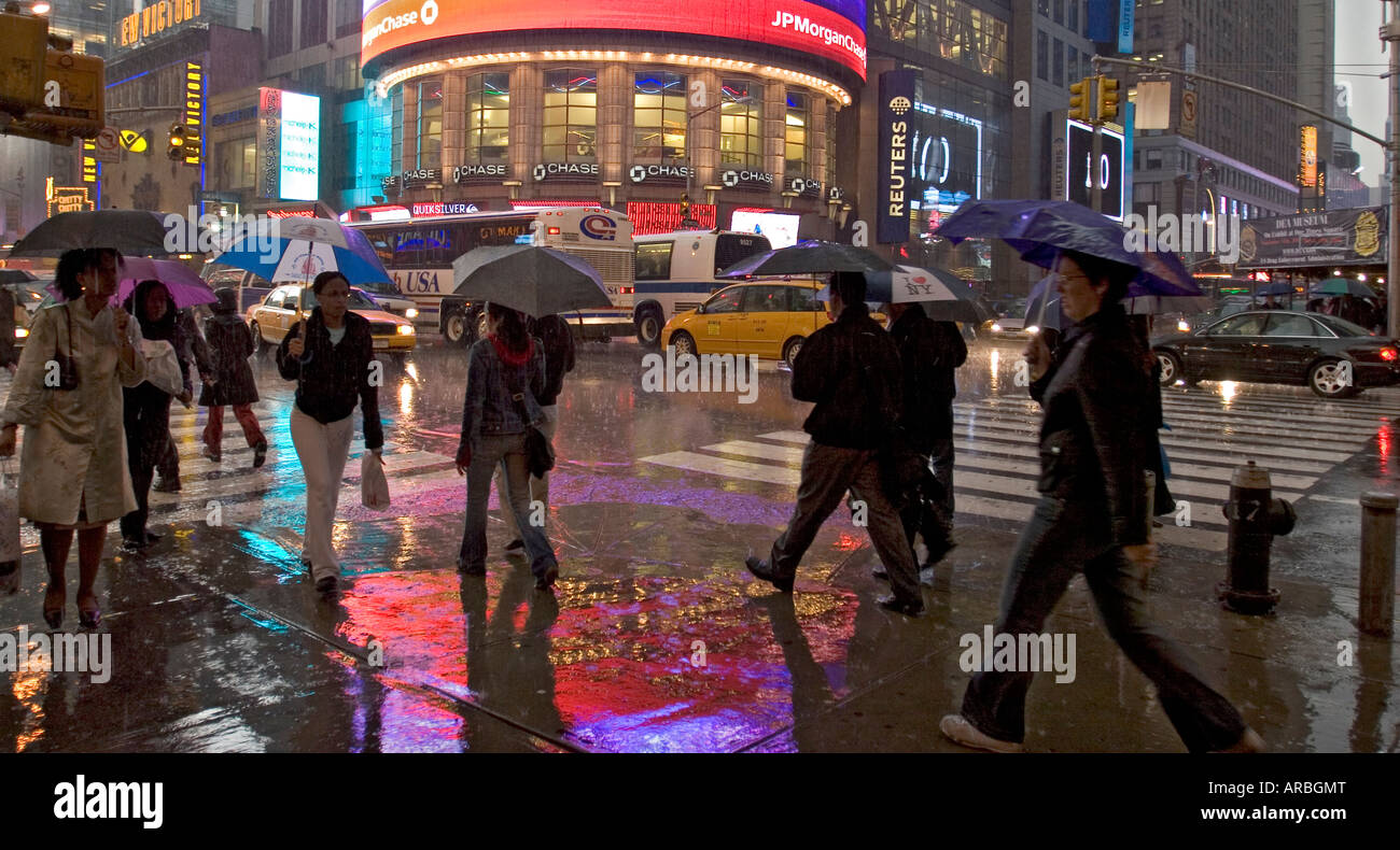 A rainy day in the Times Square area of Manhattan around 42nd Street ...