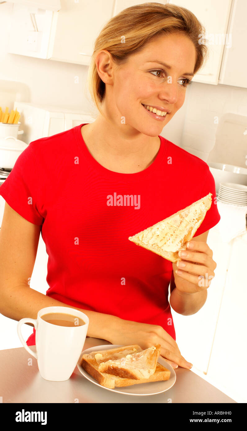 GIRL EATING TOAST Stock Photo - Alamy