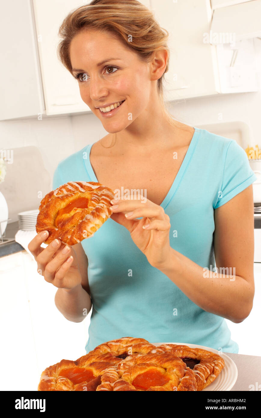 GIRL EATING DANISH PASTRIES Stock Photo - Alamy