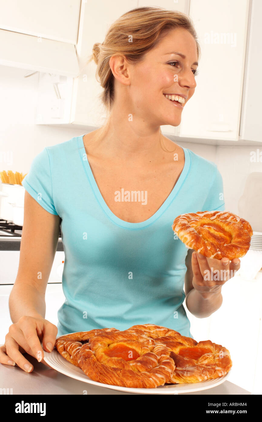 GIRL EATING DANISH PASTRIES Stock Photo - Alamy