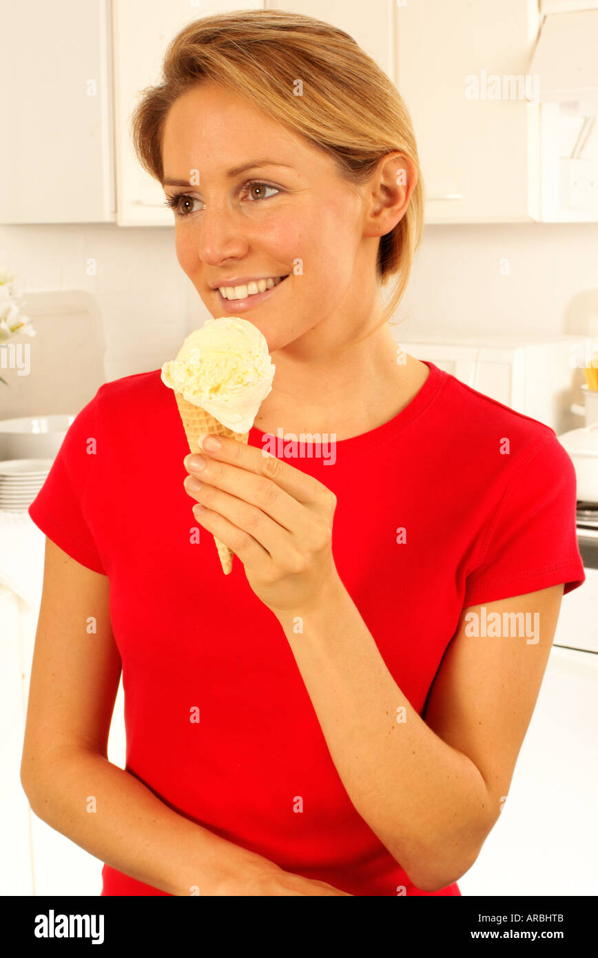 GIRL EATING ICE CREAM CONE Stock Photo - Alamy