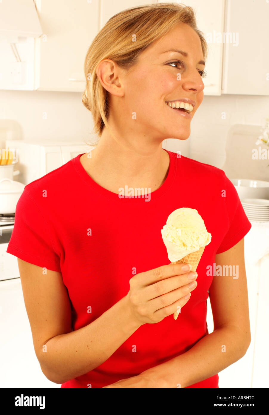 GIRL EATING ICE CREAM Stock Photo - Alamy