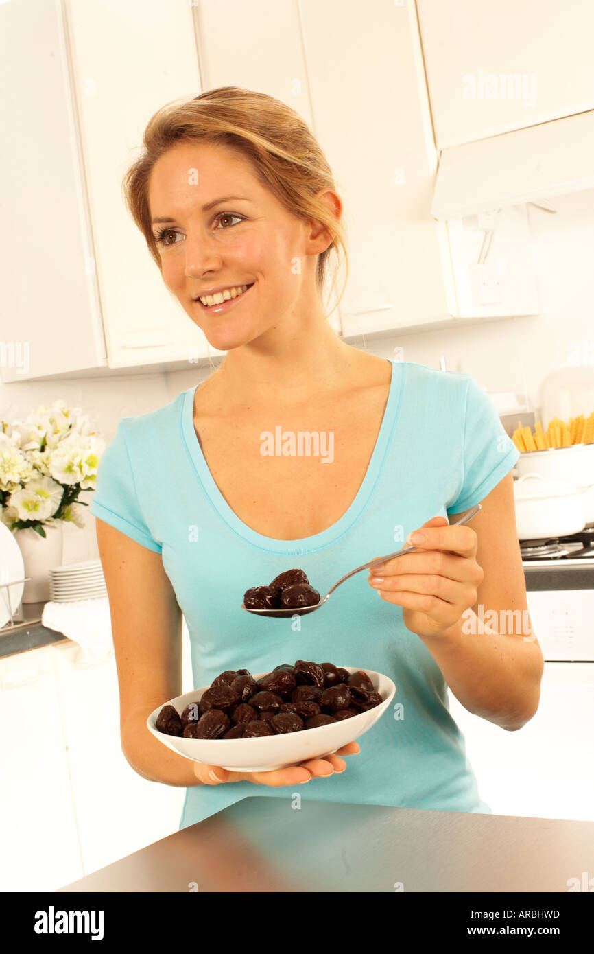 Dried prunes in spoon hi-res stock photography and images - Alamy