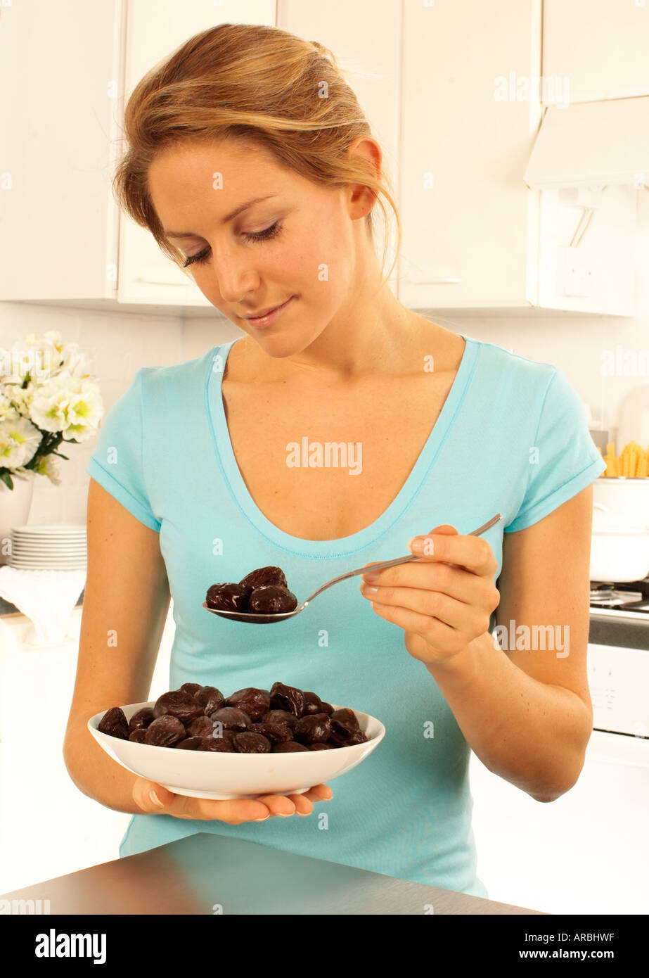 Dried prunes in spoon hi-res stock photography and images - Alamy
