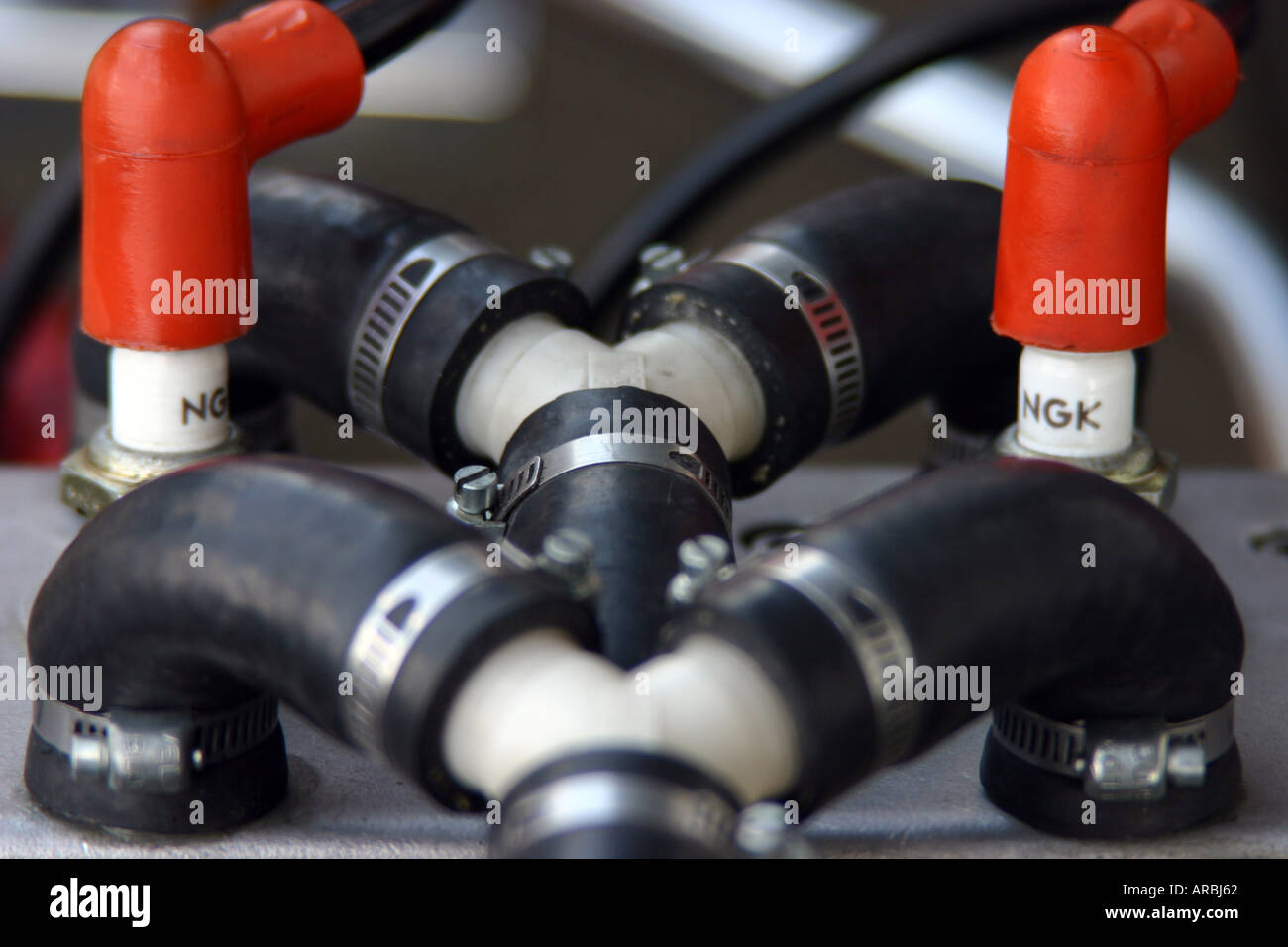 spark-plugs and waterpipes on an engine Stock Photo - Alamy