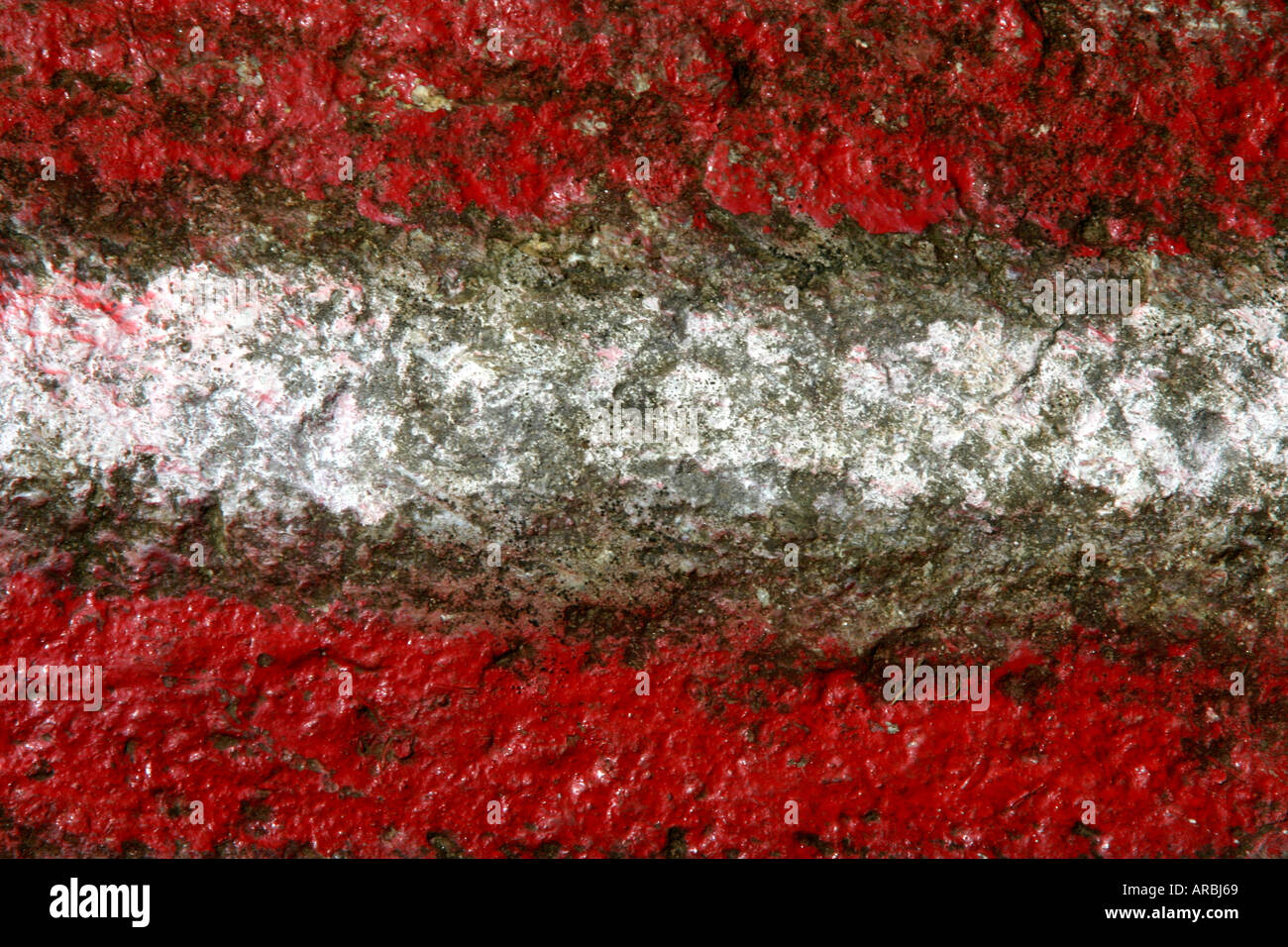 red-white-red marking on a stone Stock Photo - Alamy