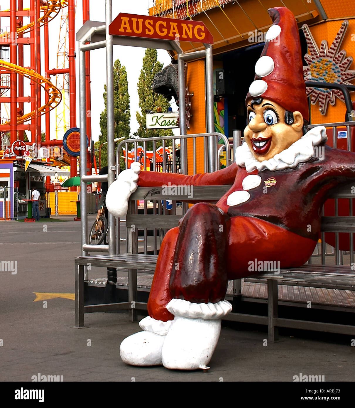 clown sitting on a bench in the viennese Prater Stock Photo - Alamy