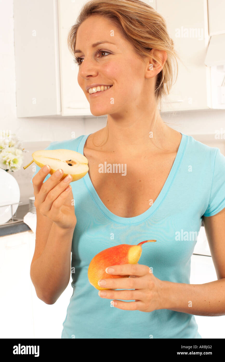 Woman with pears hi-res stock photography and images - Alamy