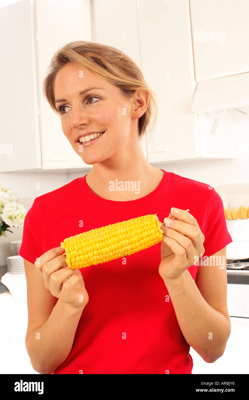 Young woman eating corn on the cob hi-res stock photography and images ...
