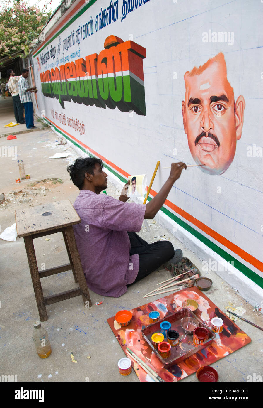 A man hand paints a billboard advertisement in India Stock Photo - Alamy