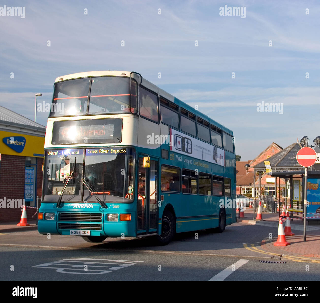 Double decker bus departing bus station, Wirral, UK 2005 Stock Photo ...