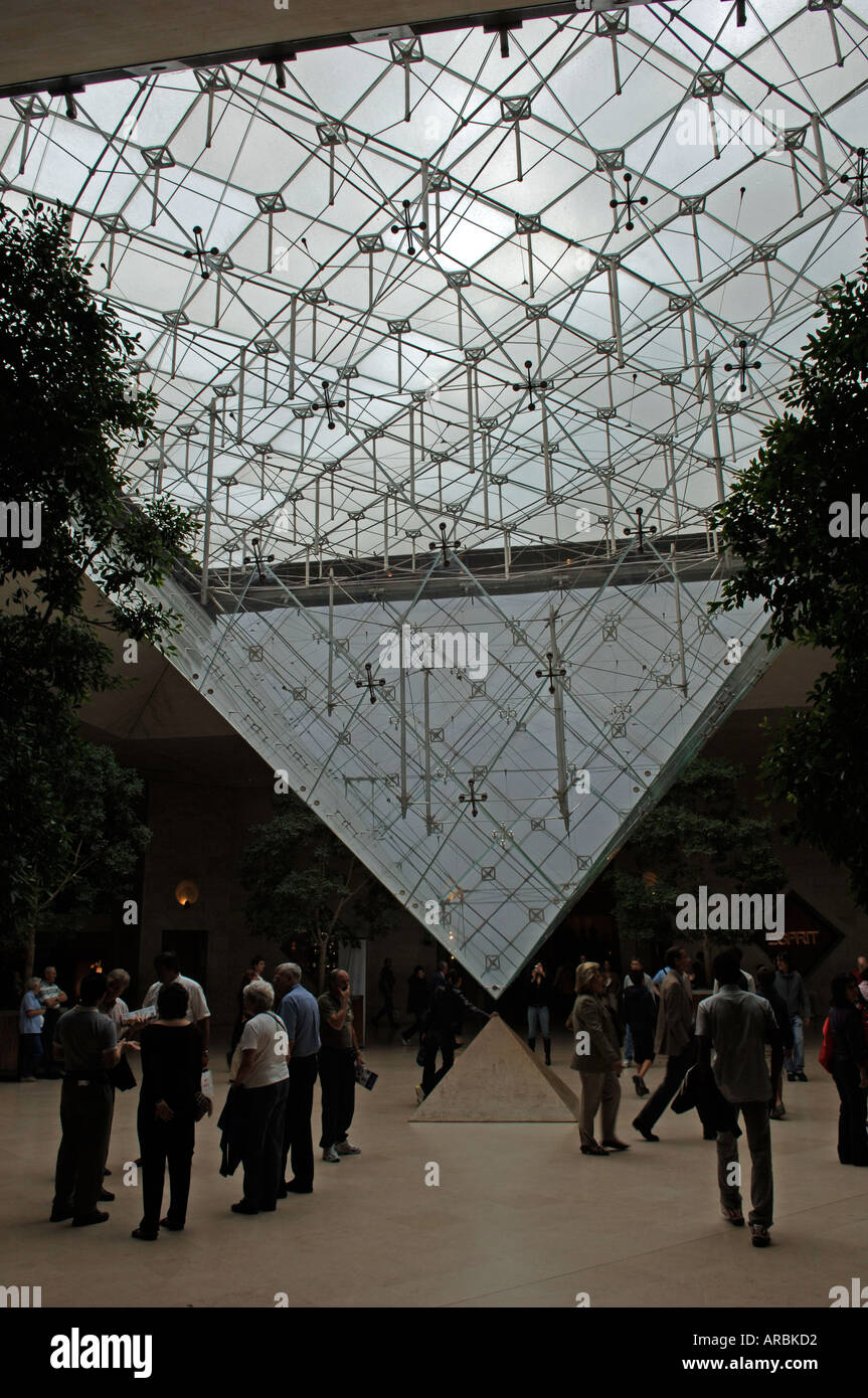 Interior view of the inverted pyramid in the Louvre Museum Paris France ...