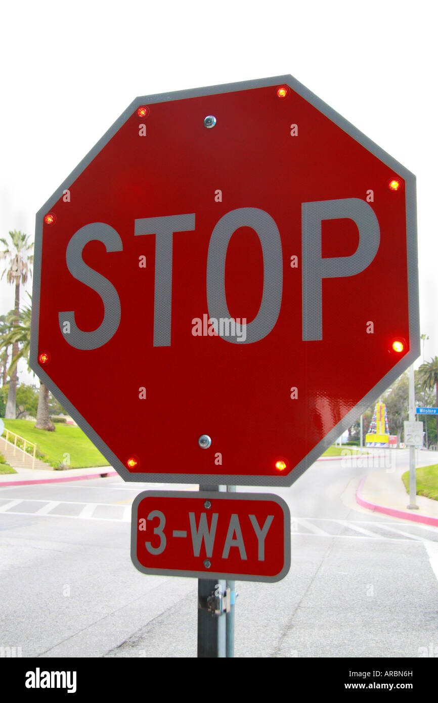 Traffic stop sign with red warning lights Stock Photo - Alamy