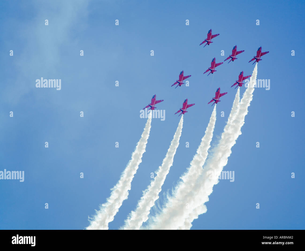 Red Arrows Royal Air Force Aerobatic Team in Pyramid / Vulcan formation ...