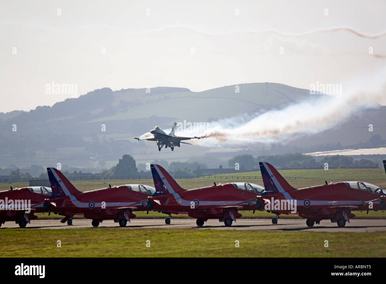 Royal Netherlands Air Force F-16AM low level pass trailing smoke before ...
