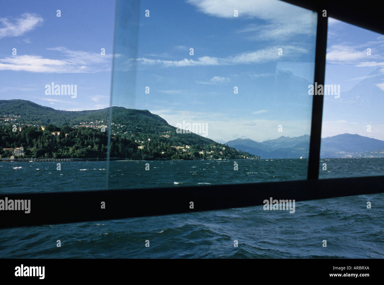 the Lake Maggiore through the glass of a ferry boat Italy Stock Photo ...