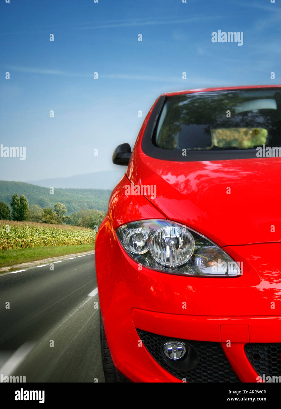 Red car on the highway Stock Photo - Alamy