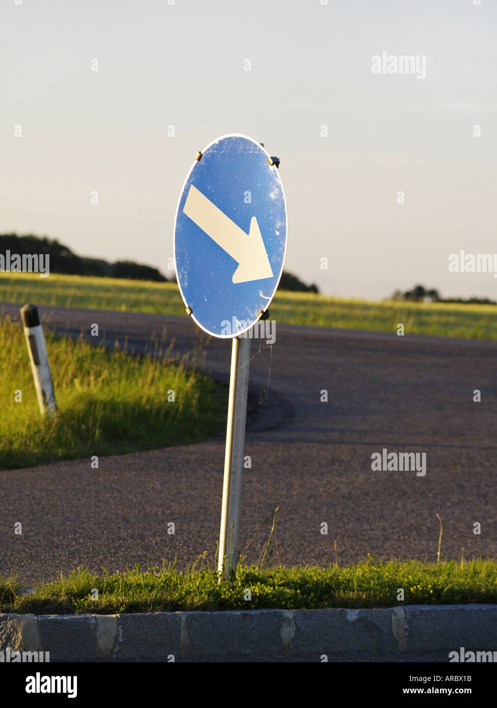 traffic sign, arrow, keep right Stock Photo - Alamy