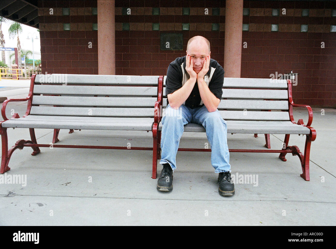 Bored man bench hi-res stock photography and images - Alamy