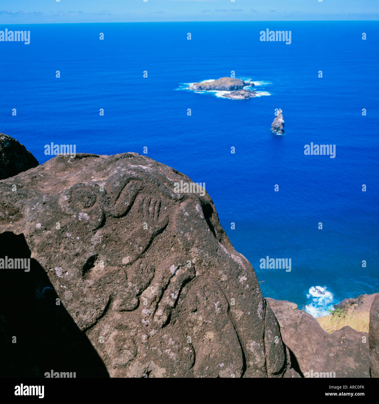 Birdman petroglyphs, offshore lie bird islands of Motu Kao Kao, Motu ...