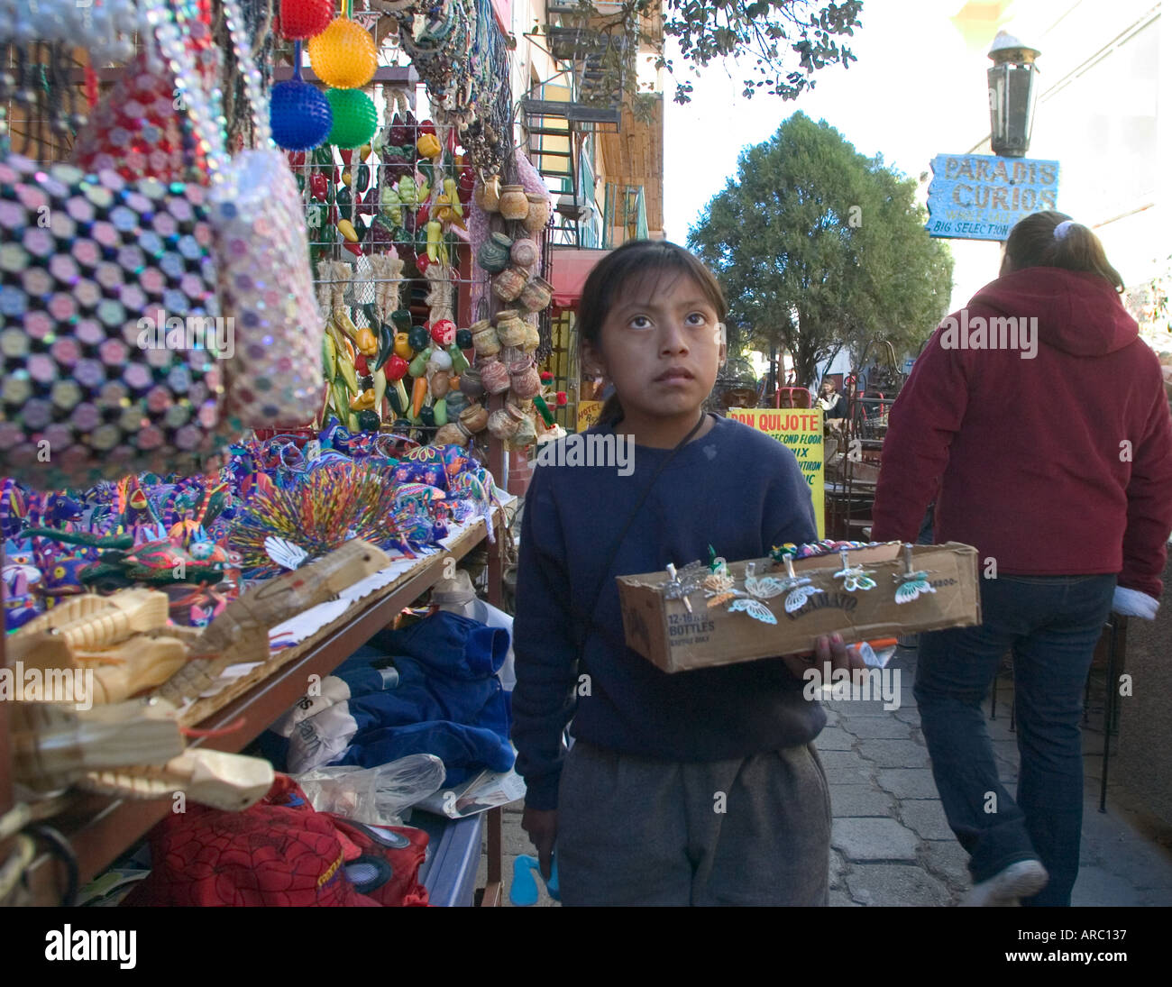 Young girl selling goods on the street of Nogales Mexico Stock Photo ...