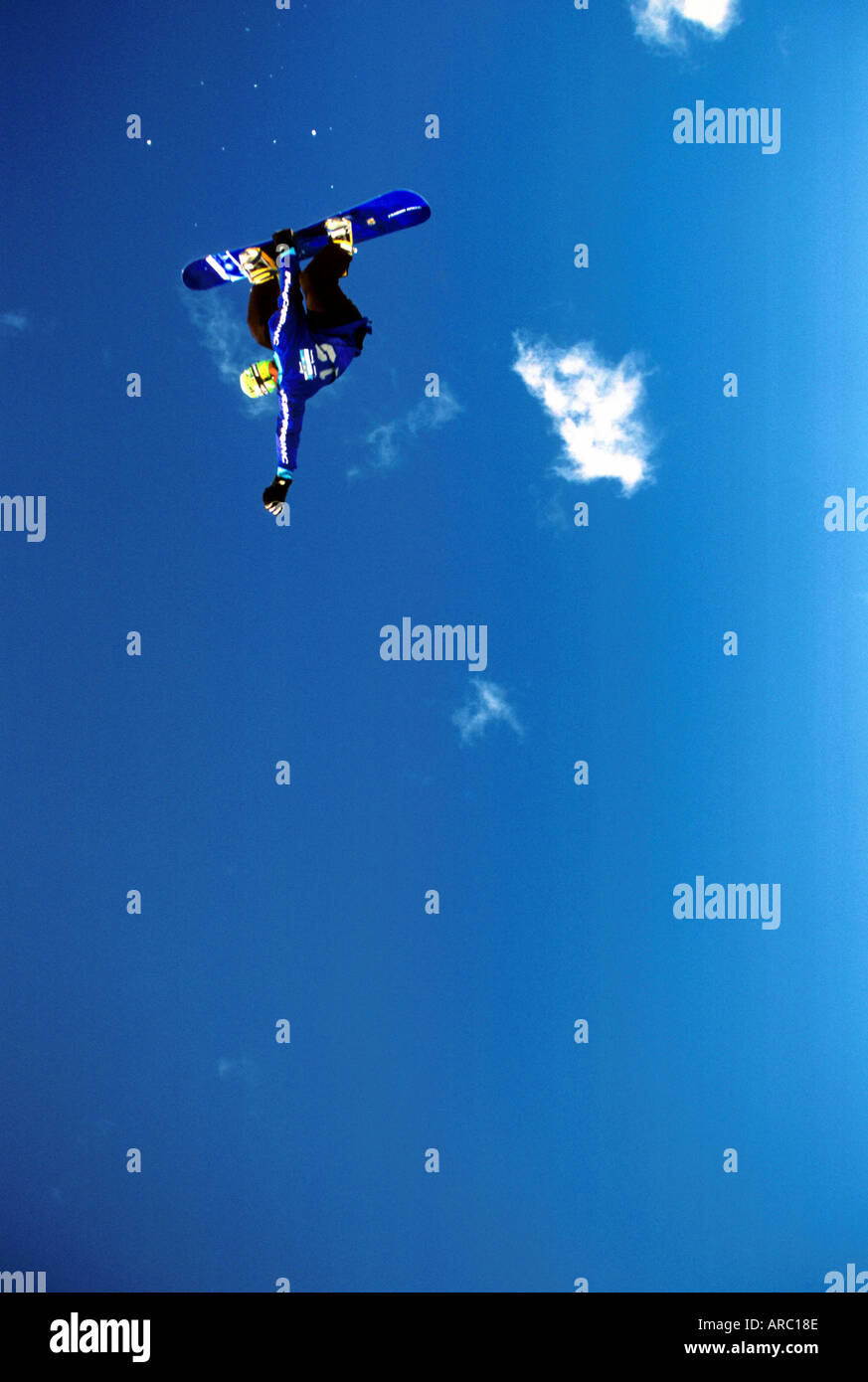 Snowboarder performing grab at big air competition in Canada Stock ...